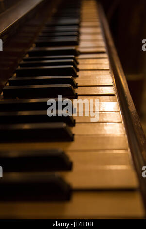 Old pianos old color tone as background Stock Photo - Alamy