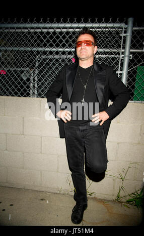 U2 Bono look like impersonator kisses fan Producers & Engineers Wing ...