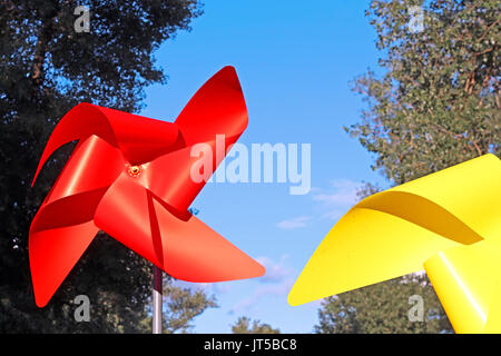 Large red and yellow children pinwheels in the Natalka park, Kyiv ...