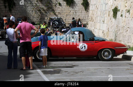 Classic cars racing at the 2012 Malta Grand Prix. (Shown here: Racing ...