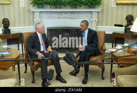 Prime Minister Malcolm Turnbull (left) and Australian Federal Police ...