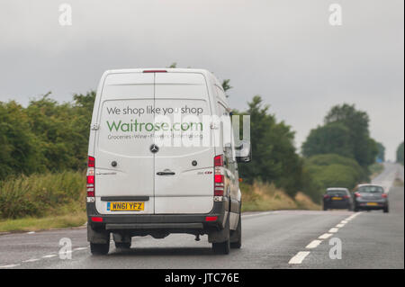 Mercedes Sprinter van driving in a rain storn on Interstate highway 10 ...