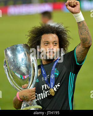 Real Madrid's Marcelo celebrates with the trophy during the UEFA ...