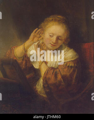 Rembrandt Woman with a Mirror Stock Photo - Alamy