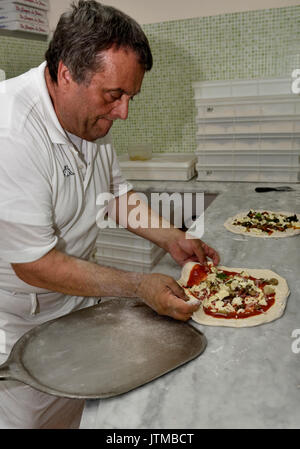 Italy, Naples: Pizza, the making of Stock Photo - Alamy