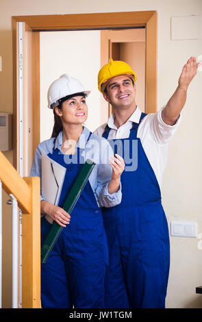 Professional maintenance crew of two specialists indoors Stock Photo ...