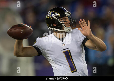 Baltimore Ravens quarterback Josh Woodrum (1) is under pressure from ...