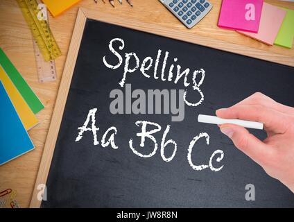 Digital composite of Hand writing spelling on blackboard Stock Photo ...
