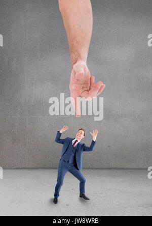 Scared man with his hands against the wall watching and waiting for ...