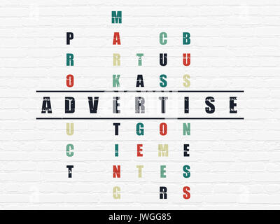 Advertising concept: Advertise in Crossword Puzzle Stock Photo - Alamy