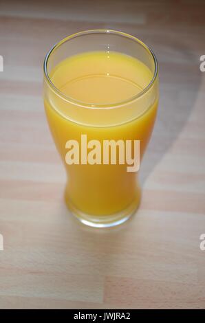 five a day, Fresh squeezed pint of orange juice Stock Photo - Alamy