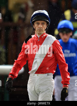 Ted Durcan makes his way into the parade ring prior to the Betfred Rose ...