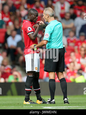 Manchester United's Eric Bailly is shown a red card and is sent off ...