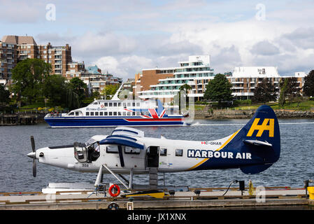 Colourful Seaplanes in the Inner Harbour Area of Victoria with Boats ...