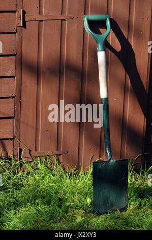 garden tools and axes choppers spades and forks to dig the garden and ...