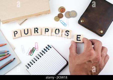 Purpose concept. Wooden letters on a white background Stock Photo - Alamy