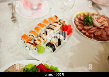 Good-looking wedding banquet table with various dishes Stock Photo - Alamy