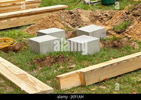 cement blocks used for wood beam footings Stock Photo - Alamy
