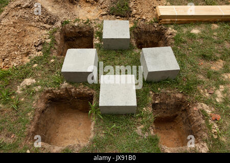 cement blocks used for wood beam footings Stock Photo - Alamy