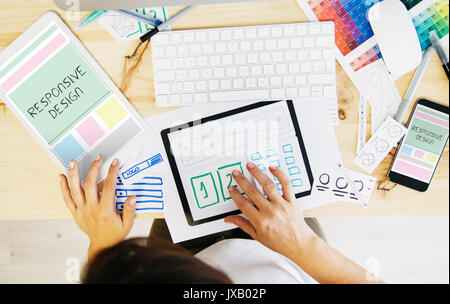 woman designing a responsive website Stock Photo - Alamy