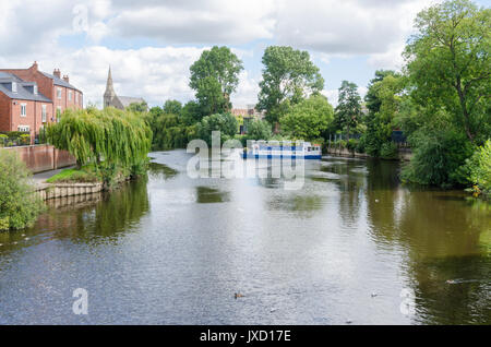 Visitors on a river cruise on the river Severn in Shrewsbury ...