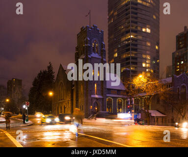 Church illuminated by lights on busy street Stock Photo - Alamy