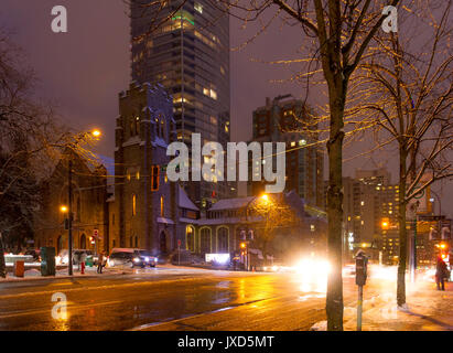 Church illuminated by lights on busy street Stock Photo - Alamy