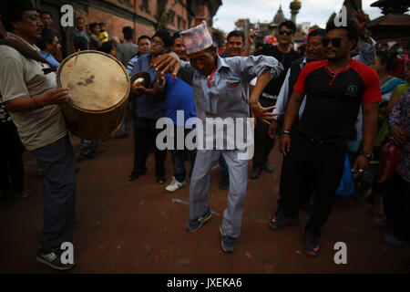 Lalitpur, Nepal. 16th Aug, 2017. Devotees carry a chariot of Lord ...