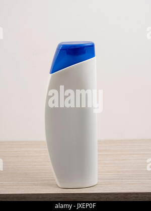Plastic white no name shampoo containers Stock Photo - Alamy