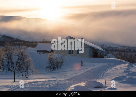 Colorful sunrise behind lonely house in winter Stock Photo - Alamy