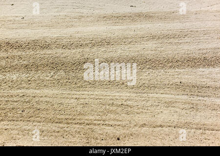 Raked sand background pattern and texture in a Japanese zen garden with ...