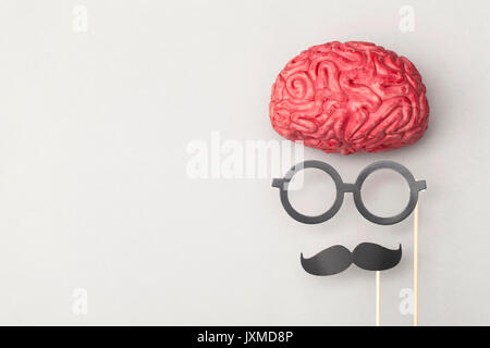 Human brain with comedy props Stock Photo - Alamy