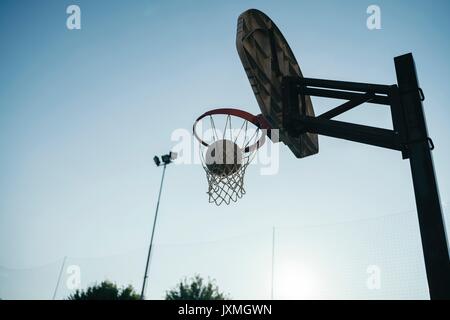 Low angle view of the basketball net in the park on a sunny day Stock ...