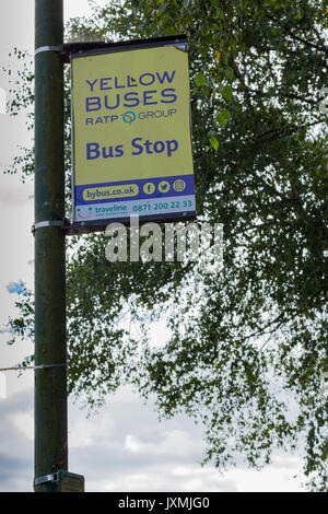 Bus stop sign for Bournemouth yellow buses Stock Photo - Alamy