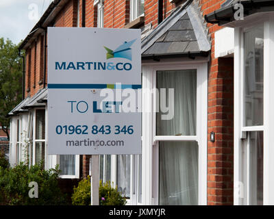 Martin and Co Estate agent sign advertising residential house to let ...