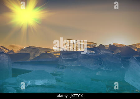 Joyful mood. Spring sparkles and shines on melting ice. Sun hits eye ...
