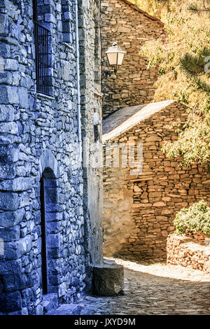 Stone church sited in a town of Spain, Montañana Stock Photo - Alamy
