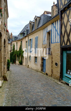 street and wall art at the old houses in the old town of zona Velha in ...