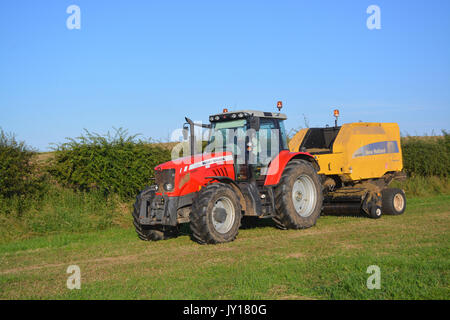 Massey Ferguson MF6480 with baler Stock Photo - Alamy