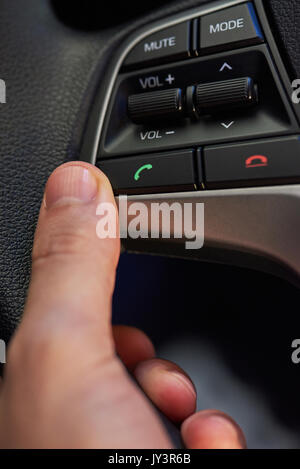 Call buttons on car steering wheel. Audio control buttons on the ...
