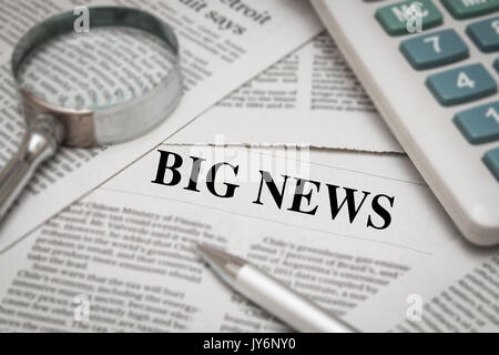 big news headline on newspaper background Stock Photo - Alamy
