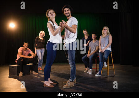 Actors practicing play on stage Stock Photo - Alamy