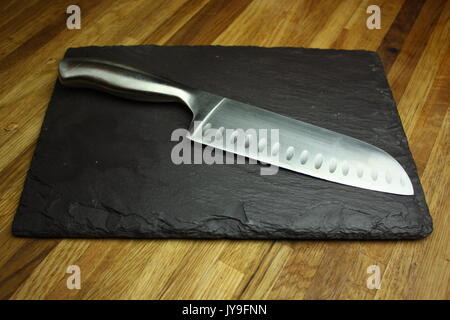 Sharp knife of slate board Stock Photo - Alamy