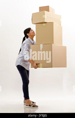 asian woman carrying stack of boxes Stock Photo - Alamy