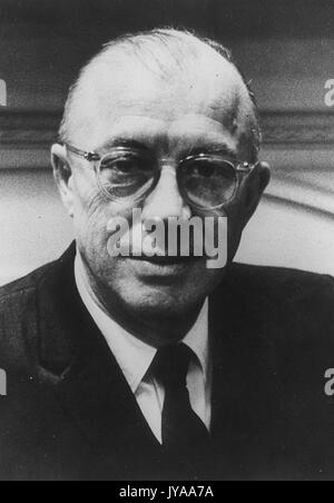 Milton Eisenhower, president of Johns Hopkins University, converses ...