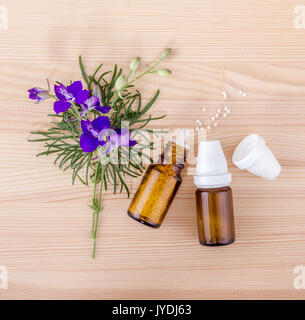 Homeopathic remedy with blooming aconite Stock Photo - Alamy