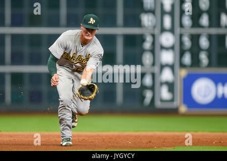 Oakland Athletics' Matt Chapman fields a ball during a baseball ...