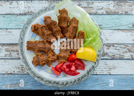 Cigkofte turkish meatball from bulgur side view Stock Photo - Alamy