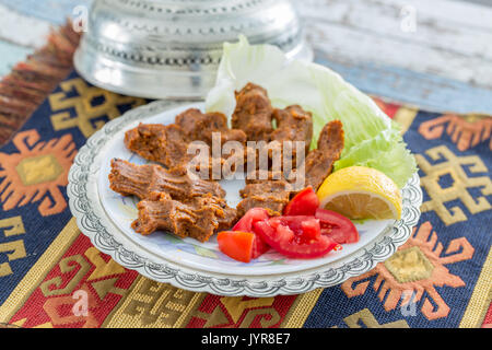 Cigkofte turkish meatball from bulgur side view Stock Photo - Alamy