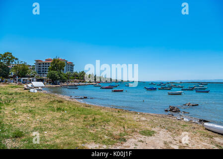 Turkey, Cesme, View of fishing harbour at dusk Stock Photo - Alamy